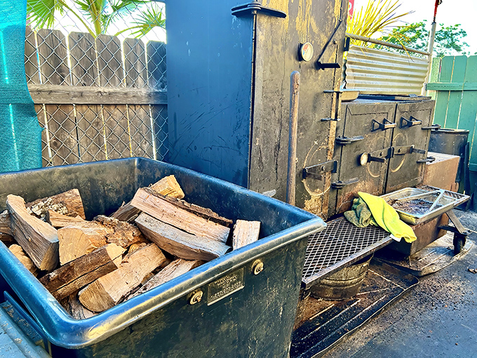 The smoking setup&mdash;where wood, metal, time, and expertise combine in the alchemy that turns ordinary meat into extraordinary barbecue.