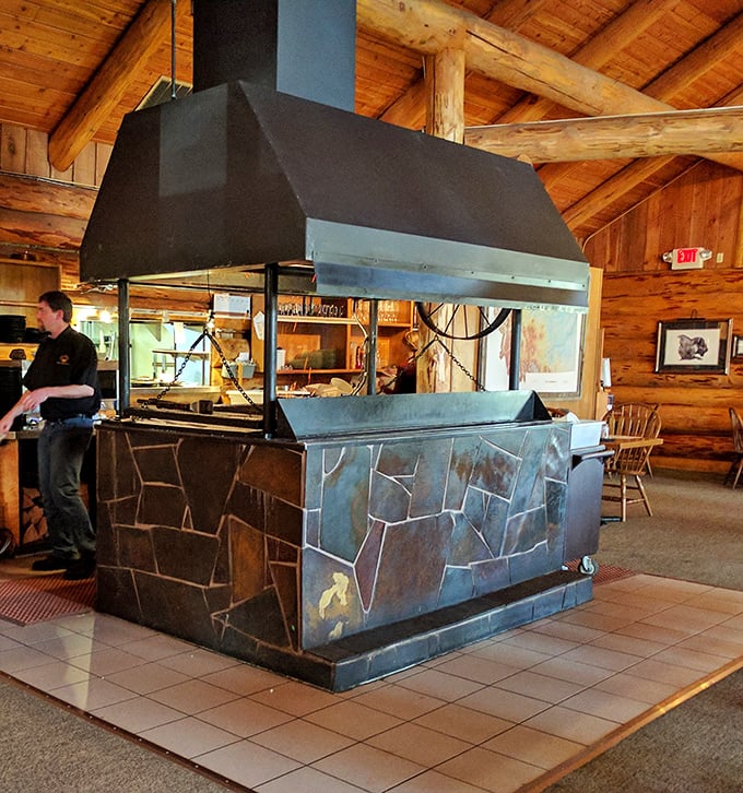 The open-flame cooking station isn't just for show&mdash;it's meat theater where steaks perform their transformation from raw to remarkable.