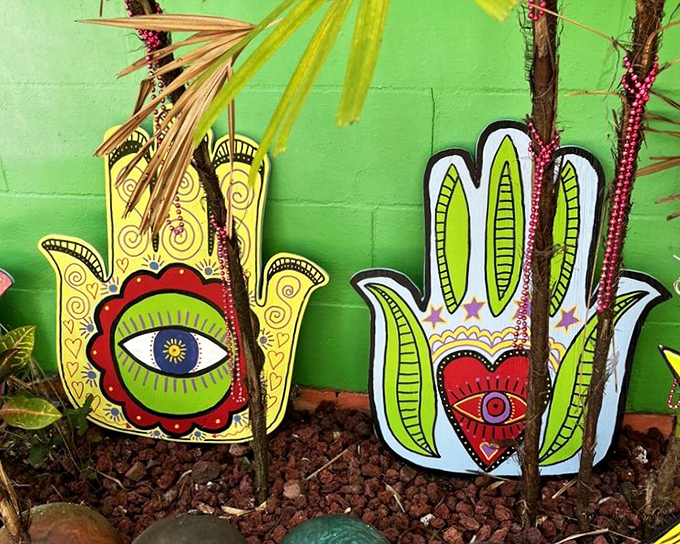Hamsa hands that seem to say, "High five for creativity!" These palm readers predict a future filled with color and imagination.
