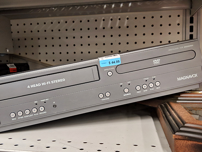 Audio enthusiasts rejoice! This Magnavox 4-head Hi-Fi stereo VCR combo awaits its second act in someone's vintage entertainment setup.