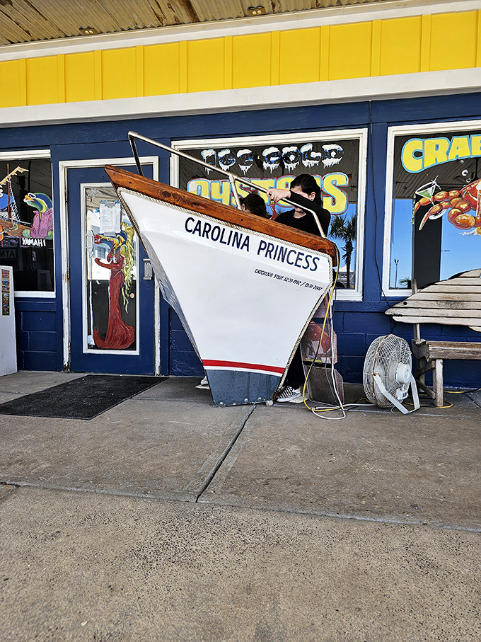 The boat bow entrance is both practical nautical decor and the perfect Instagram spot to announce you've found the real Florida.