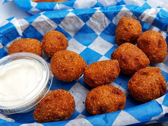 Hushpuppies: golden orbs of cornmeal joy that somehow manage to be both crispy and tender. The perfect supporting actor to the whitefish's star performance.
