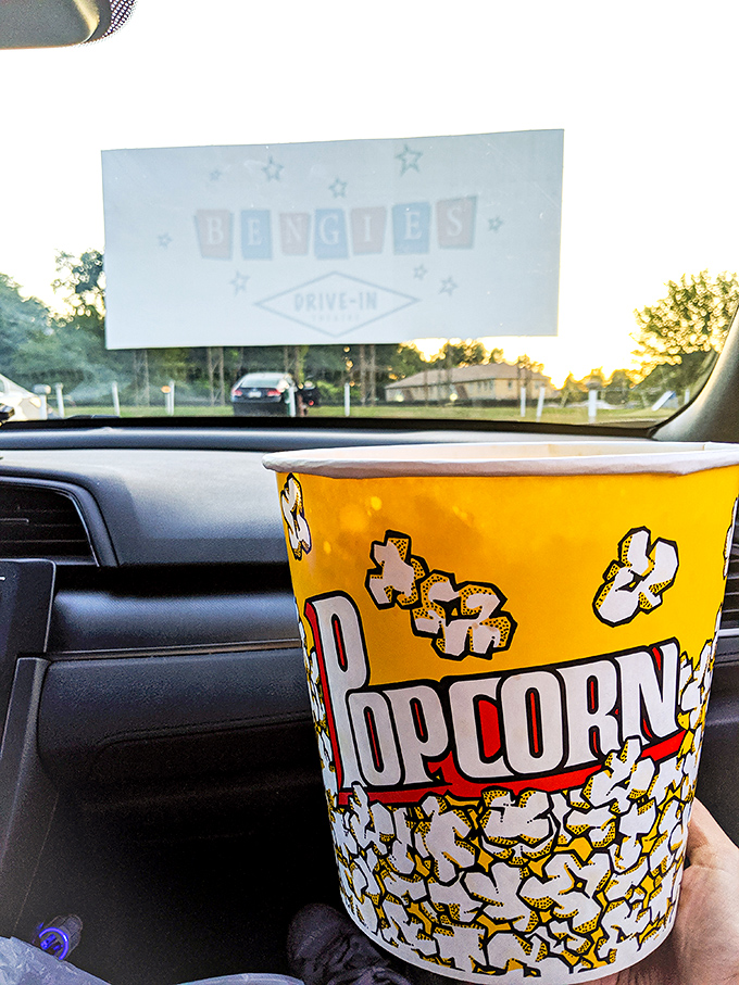 The perfect movie-watching tableau: buttery popcorn in the foreground, Bengies' massive screen in the background, and nostalgia filling everything in between.