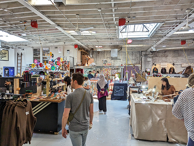 The market's soaring ceilings and natural light create a treasure-hunting playground where discoveries lurk around every corner.