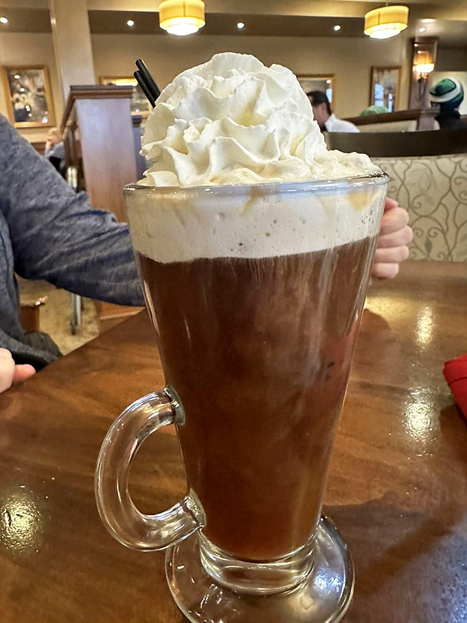 That's not just coffee &ndash; it's a warm hug in a glass. The whipped cream mountain on top is your invitation to indulge.
