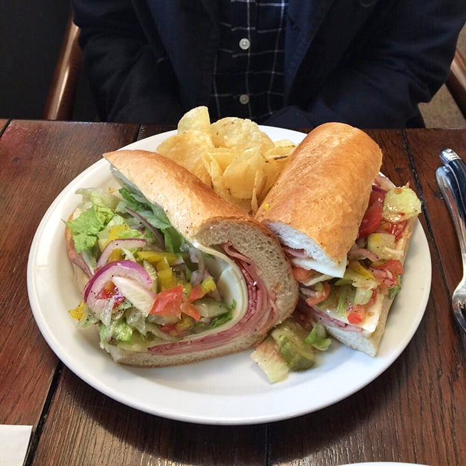 An Italian grinder so stuffed it requires a strategy to eat. The bread-to-filling ratio here is what mathematicians call "the golden ratio of sandwich perfection."