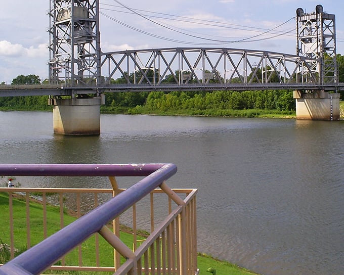The Jackson Street Bridge spans the Red River, connecting Alexandria to Pineville while offering views that rival those of cities with twice the cost of living.