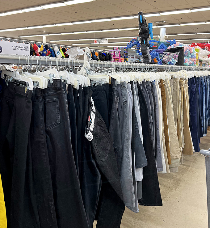 Denim democracy in action &ndash; jeans of every shade and size hanging in perfect formation. The great equalizer of thrift store fashion.