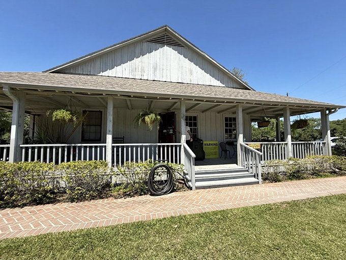 The plantation-style headquarters welcomes visitors with a porch that practically demands you sit a spell and forget about your inbox.