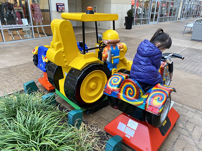 The kiddie ride&mdash;savior of shopping parents everywhere. This colorful construction vehicle buys precious minutes of additional browsing time while delighting its tiny operator.