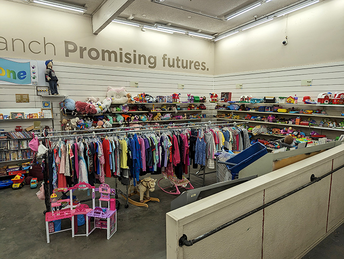 The children's section is a rainbow of possibilities. Tiny clothes and colorful toys await new adventures with the next generation.