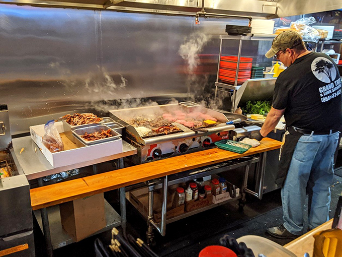 The sizzle of the grill provides the soundtrack to your hunger as skilled hands transform simple ingredients into legendary meals.