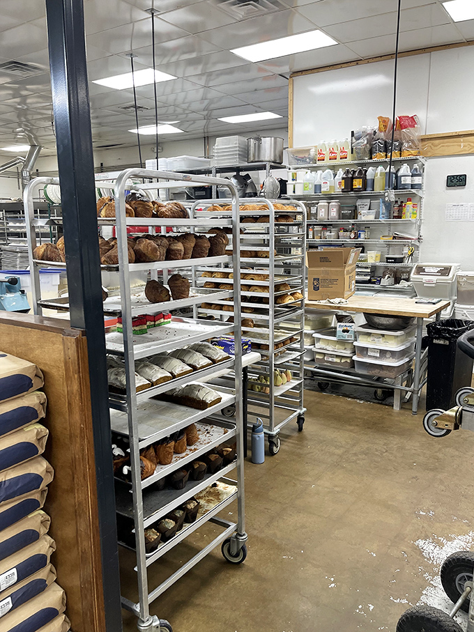 A glimpse into the kitchen reveals the behind-the-scenes magic&mdash;racks of freshly baked bread waiting for their moment in the spotlight.