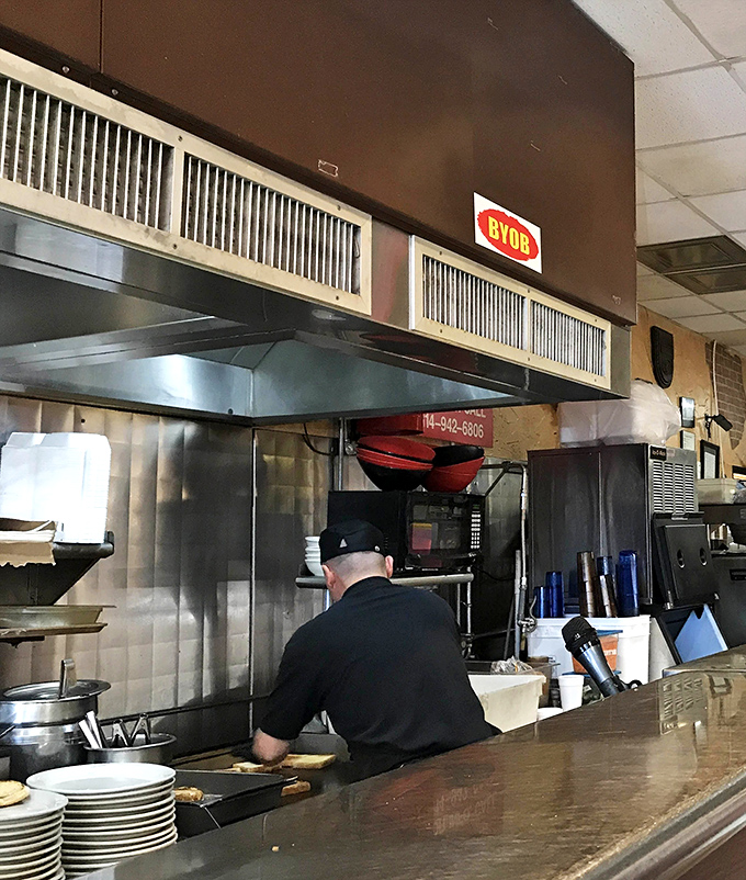 A glimpse into the kitchen where the magic happens&mdash;no molecular gastronomy, just fire, skill, and tradition.