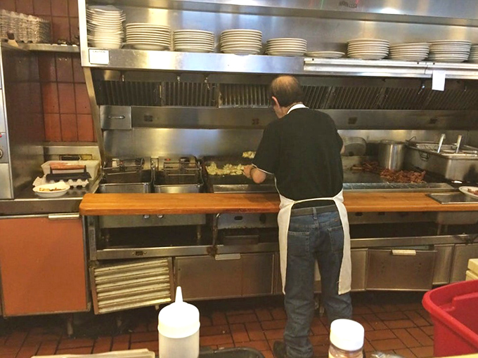 Where the magic happens: a glimpse into the kitchen reveals the choreographed dance that brings comfort food classics to your table.