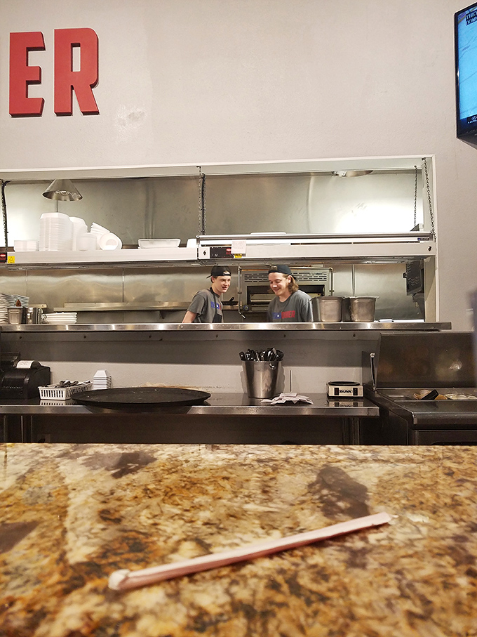 The open kitchen concept lets you witness culinary artistry in action. It's like dinner and a show, minus the ticket price.