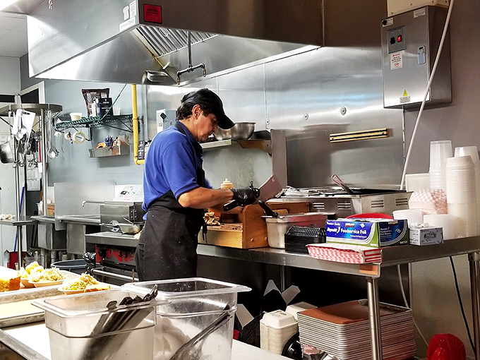 Where the magic happens: a glimpse into the kitchen sanctuary where smoke meets meat in a delicious dance of patience.