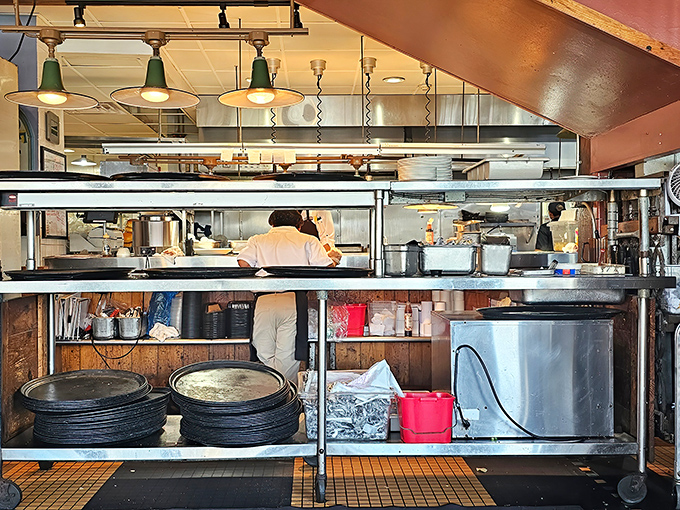 Behind-the-scenes peek at the bustling kitchen where Gulf Coast magic happens with every perfectly timed order.