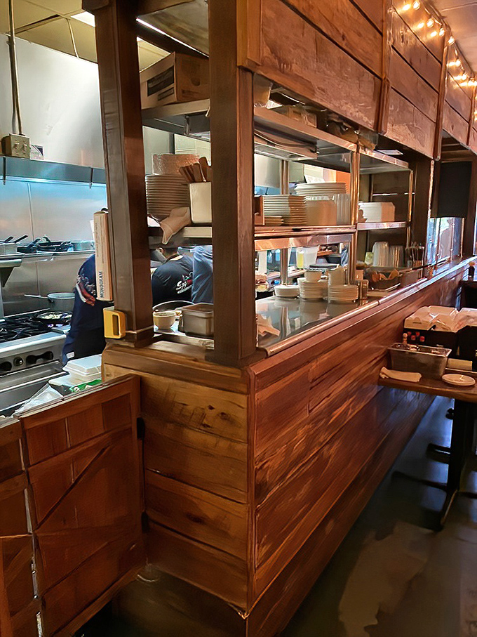 A glimpse behind the scenes reveals the organized chaos where your breakfast dreams are carefully assembled and plated.