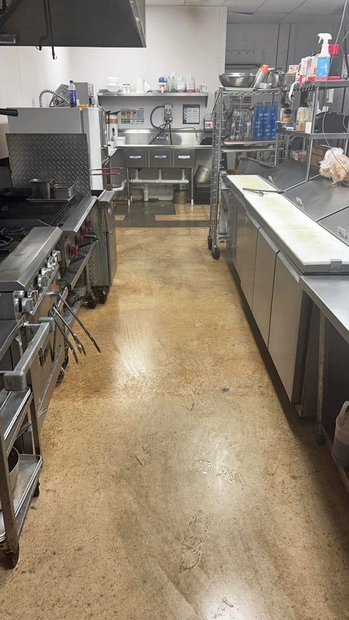 The kitchen's spotless efficiency reveals where the magic happens&mdash;stainless steel workspaces where culinary dreams come true.