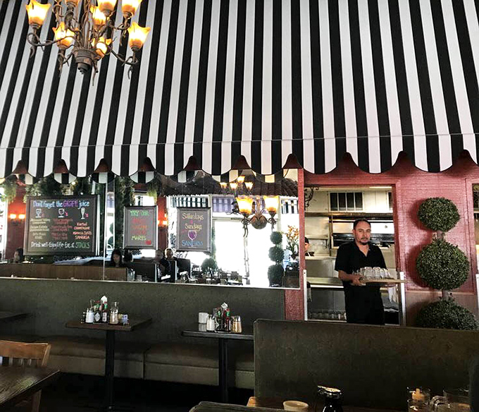 The black and white striped theme continues throughout, creating a cohesive design that's both classic and distinctly Stacks.