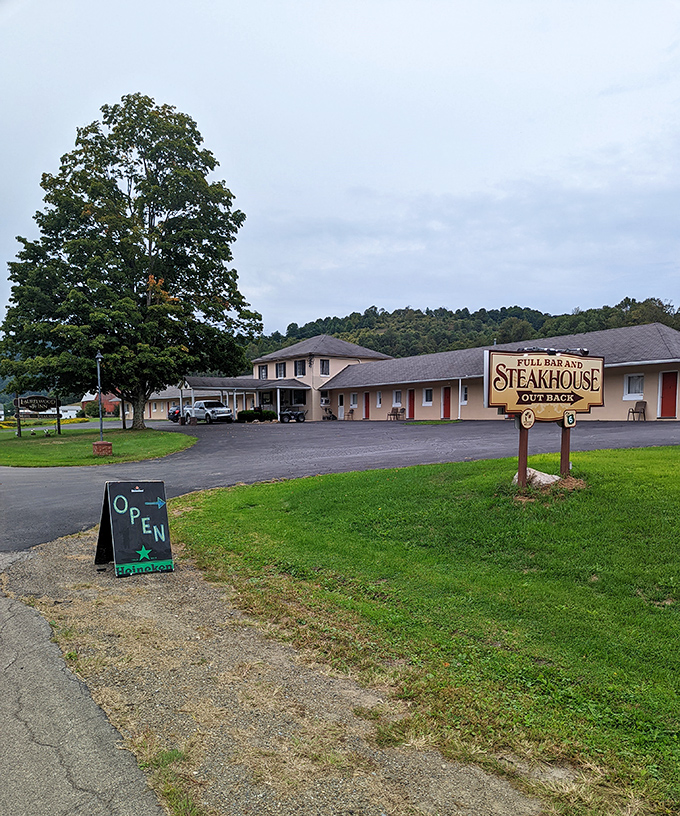 The Laurelwood Inn & Steakhouse sign promises exactly what road-weary travelers crave &ndash; a comfortable bed and a properly cooked steak after a day of exploration.