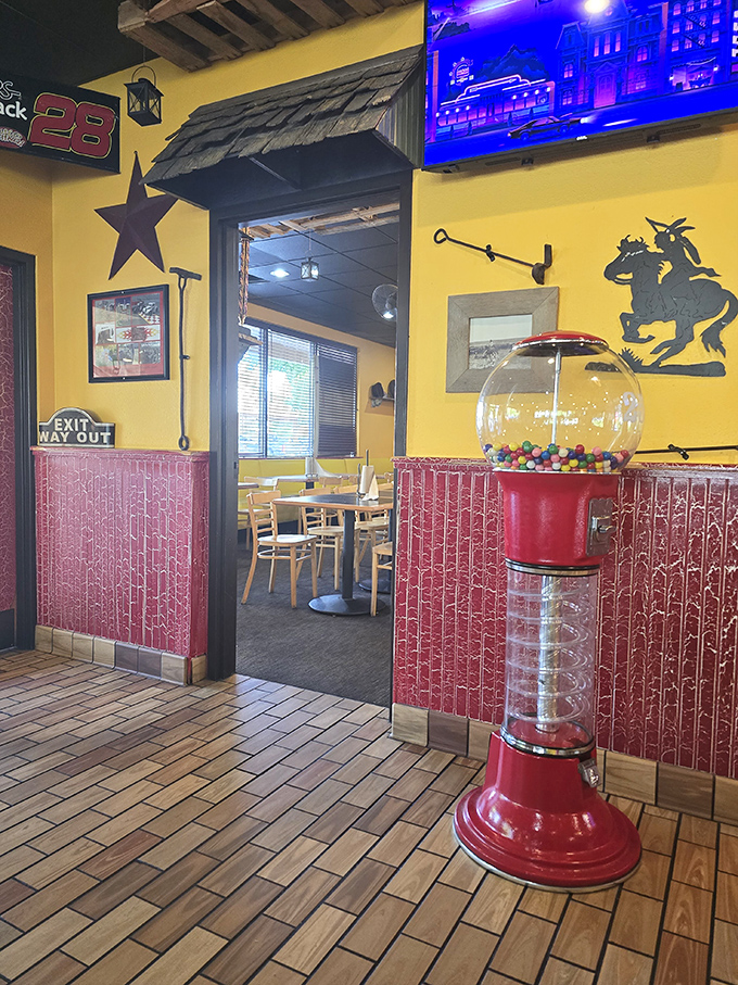 Yellow walls and western decor create the perfect BBQ backdrop. That gumball machine isn't fooling anyone &ndash; we know what you're really here for.
