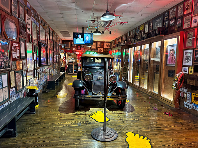 This vintage car parked inside isn't just decoration&mdash;it's a time machine to when roadside attractions promised both spectacle and sustenance.