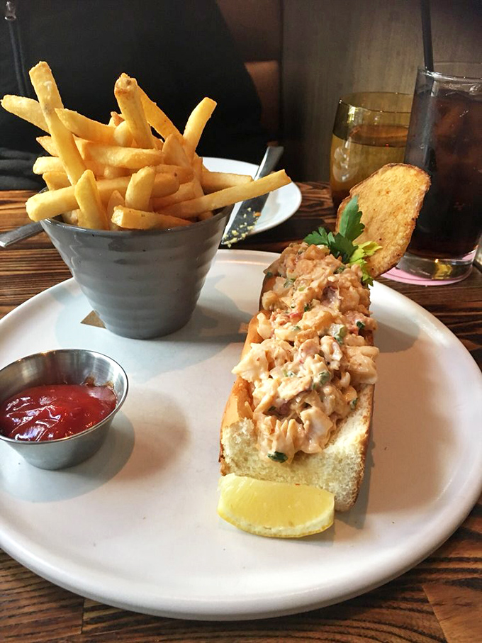 This lobster roll isn't messing around&mdash;chunky, fresh seafood barely contained by its buttery vessel, with fries standing at attention alongside.