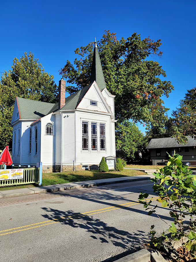 The white chapel stands as Ohiopyle's architectural exclamation point against a perfect blue Pennsylvania sky.