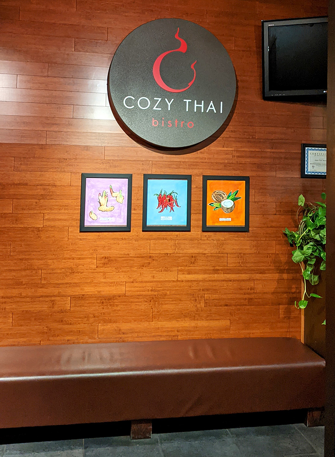 The circular logo serves as both restaurant branding and philosophical statement: life is a circle, and that circle should include Thai food.