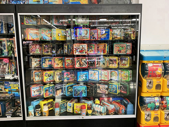 Vintage lunch boxes that once carried PB&Js now carry memories. The Fonz, Star Wars, and Scooby-Doo preserved behind glass like museum pieces.