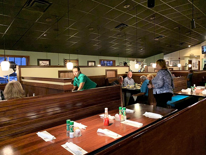 The spacious dining room with its wooden booths offers the perfect setting for everything from casual lunches to celebration dinners.