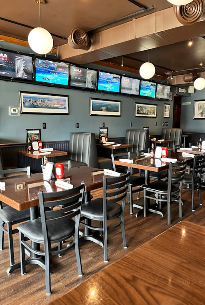 The dining room's thoughtful layout offers both intimacy and community, with Boston cityscapes watching over your meal like old friends.