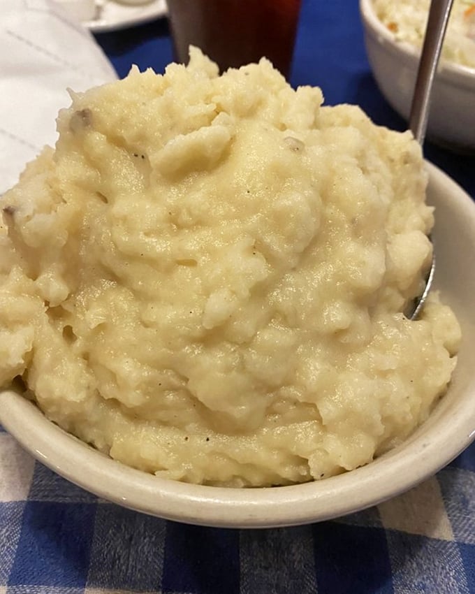 These mashed potatoes aren't just a side dish&mdash;they're a cloud of comfort. One spoonful and you'll understand why people drive miles for this humble masterpiece.
