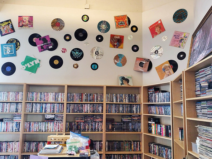 Vinyl records and DVDs create a nostalgic media corner where music lovers can dig for forgotten favorites and cinephiles can discover hidden gems.