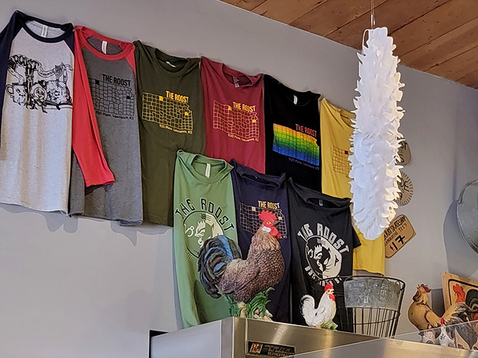 When a restaurant's merch wall looks this good, you know the food must be spectacular. That rooster t-shirt collection is basically Kansas breakfast couture.