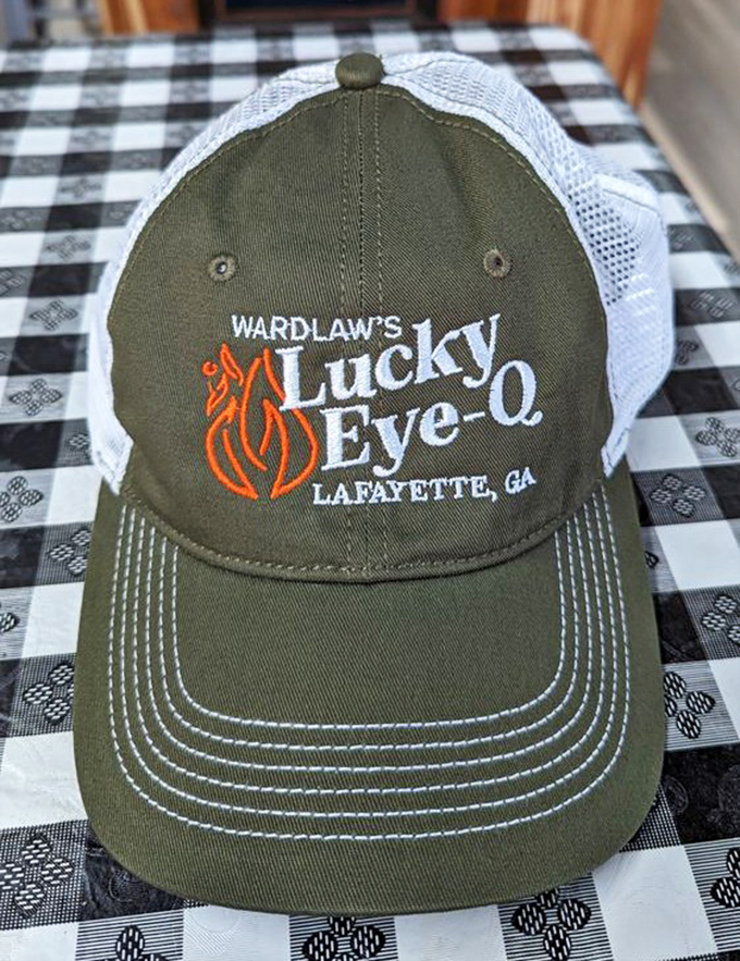 When a restaurant's hat becomes coveted merchandise, you know they've transcended mere dining to achieve cult status. Wear it like a badge of barbecue honor.