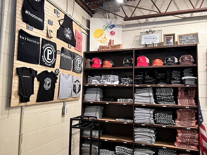 The merch wall for BBQ evangelists who want to spread the good word of Pecan Lodge long after the last bite is gone.