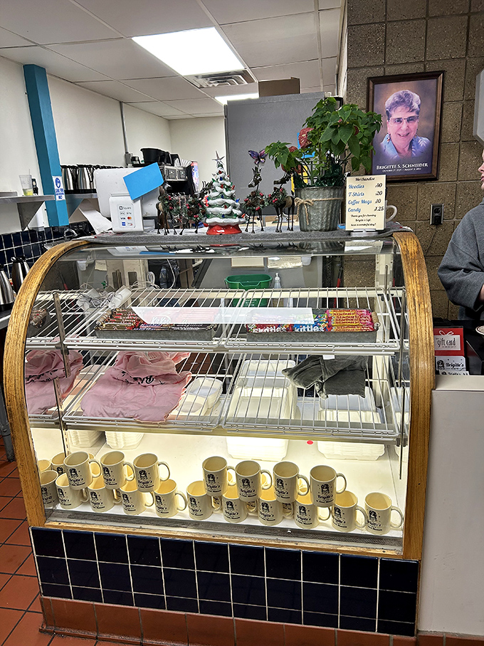 Where coffee mugs and merchandise wait to be adopted by loyal customers who want to take a piece of Brigitte's home.