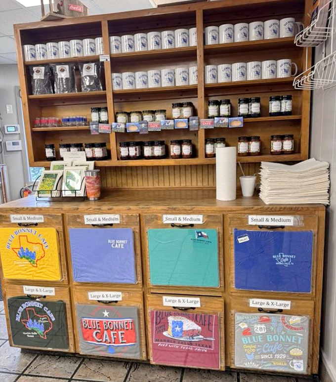 The merchandise display proves people don't just want to eat here&mdash;they want to take a piece of Blue Bonnet home. T-shirts as souvenirs of culinary pilgrimages.
