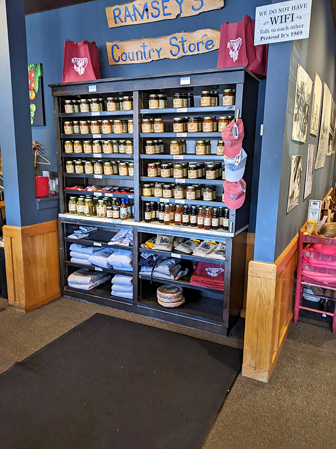 Ramsey's Country Store wall display offers jams, jellies, and sauces to take home. That "No WiFi" sign says it all—this place is about real connections.