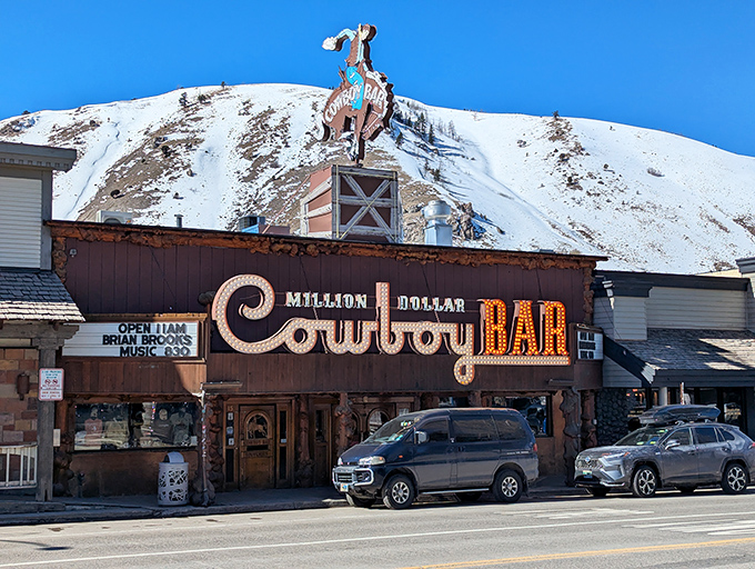 That neon cowboy on a bucking bronco has been luring folks inside for cold drinks and warm hospitality.