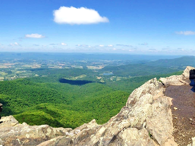 This mountain vista stretches to the horizon, offering the kind of perspective that makes your daily problems seem as significant as deciding what socks to wear.