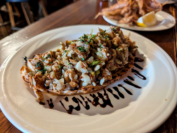 The mushroom toast arrives like an edible work of art&mdash;earthy fungi piled high on crusty bread with a dramatic balsamic drizzle setting the stage.