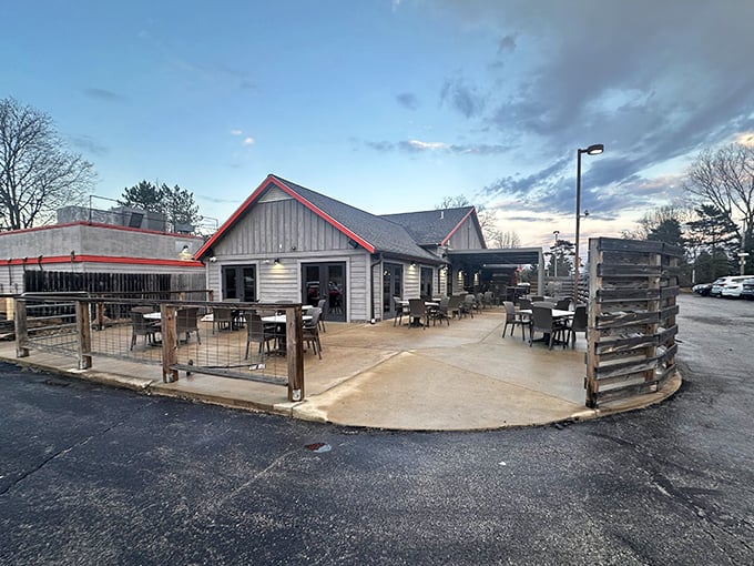 Oak and Embers Tavern's rustic-modern patio beckons with the promise of comfort food and conversation under open skies.