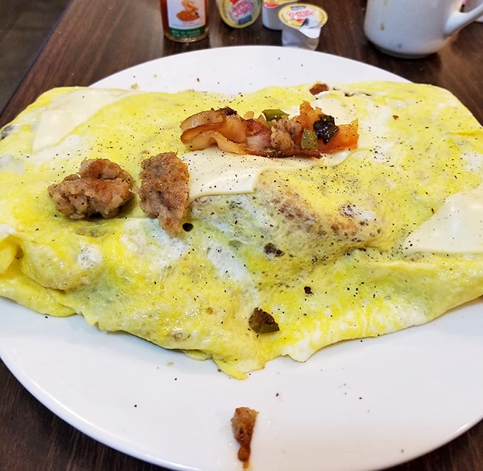 This omelet isn't just breakfast&mdash;it's a fluffy yellow canvas painted with savory ingredients that turn morning into an occasion.