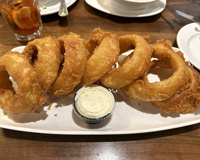 These onion rings aren't just fried&mdash;they're golden halos of crispy perfection that make you forget vegetables are supposed to be good for you.