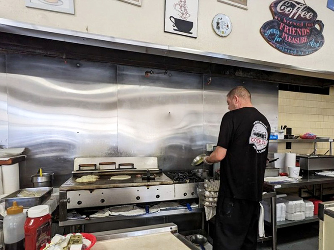 The open kitchen isn't about theatrics—it's about transparency. What you see is what you get: real cooking by people who know what they're doing.