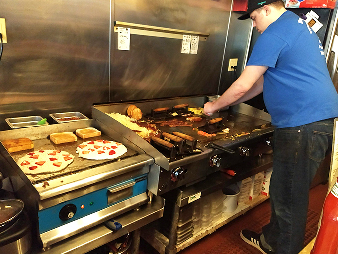 The open kitchen &ndash; where breakfast dreams become reality on a well-seasoned griddle that's seen more perfect eggs than most of us ever will.